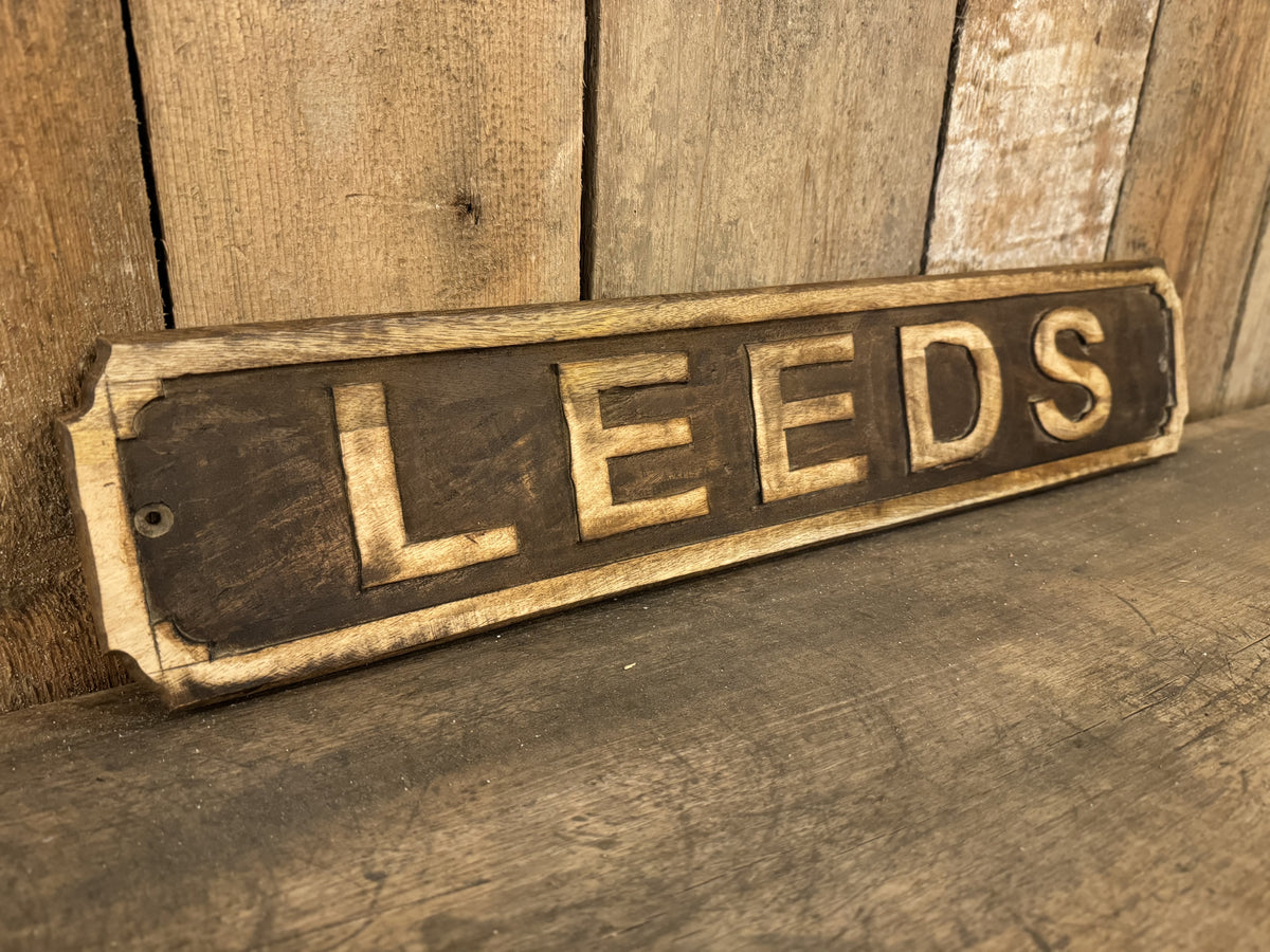 Carved Wooden Leeds Sign – Burgess Reclamation